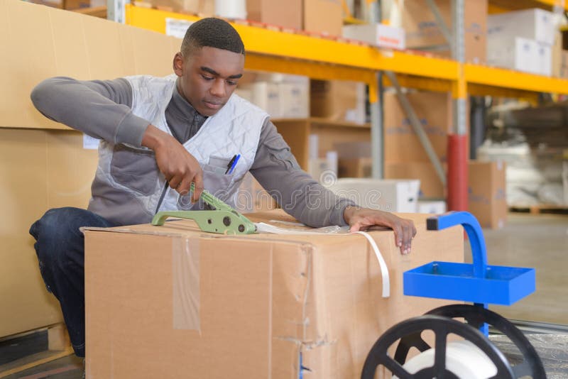 Warehouse Worker with Boxes Stock Photo - Image of close, hold: 124011288