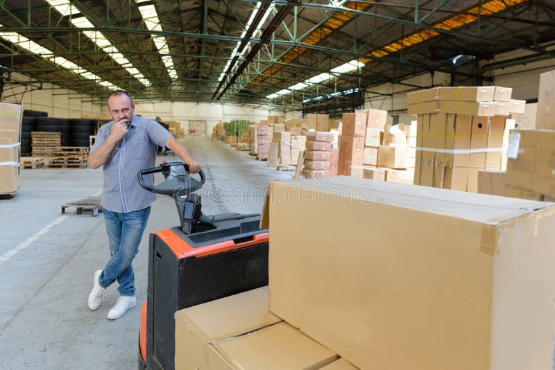 Warehouse Worker with Boxes Ready To Be Deliver Stock Photo - Image of ...