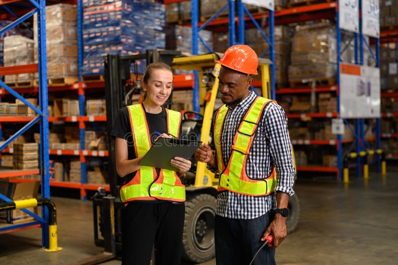 Warehouse Worker Brainstorms Checklist Product To Shelf in Warehouse ...