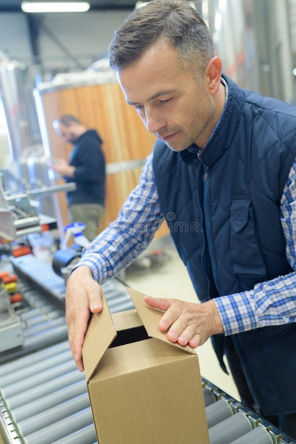 Warehouse Worker Closing Box Stock Image - Image of scanning, cardboard ...