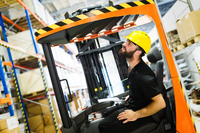 Warehouse Worker Doing Logistics Work with Forklift Loader Stock Image ...