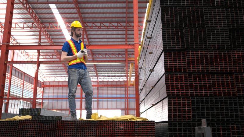 Warehouse Worker in Hard Hats and Helmets, Inspect and Count Steel ...