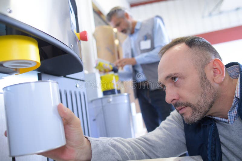 Warehouse Worker Having Break with Coffee Stock Photo - Image of people ...