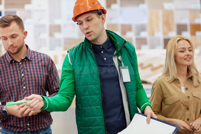 Warehouse Worker Help Customers Using Document Stock Photo - Image of ...