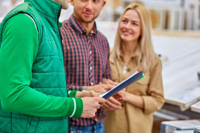 Warehouse Worker Help Customers Using Document Stock Photo - Image of ...