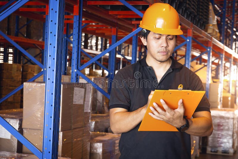 Warehouse Worker Holding Clipboard His Doing Inventory Management at ...