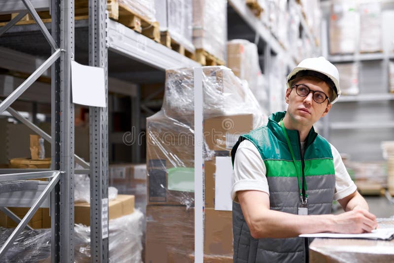 Warehouse Worker with List Checking Stock Condition Stock Image - Image ...