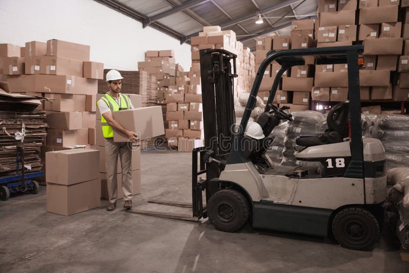 Workers in Warehouse Preparing Goods for Dispatch Stock Image - Image ...
