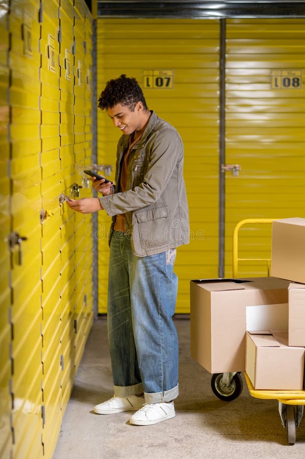 Warehouse Worker Opening the Smart Lock Stock Image - Image of loader ...