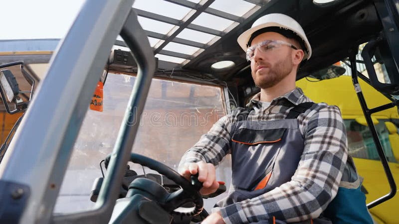 Warehouse Worker Operating a Forklift Loader Stock Footage - Video of ...