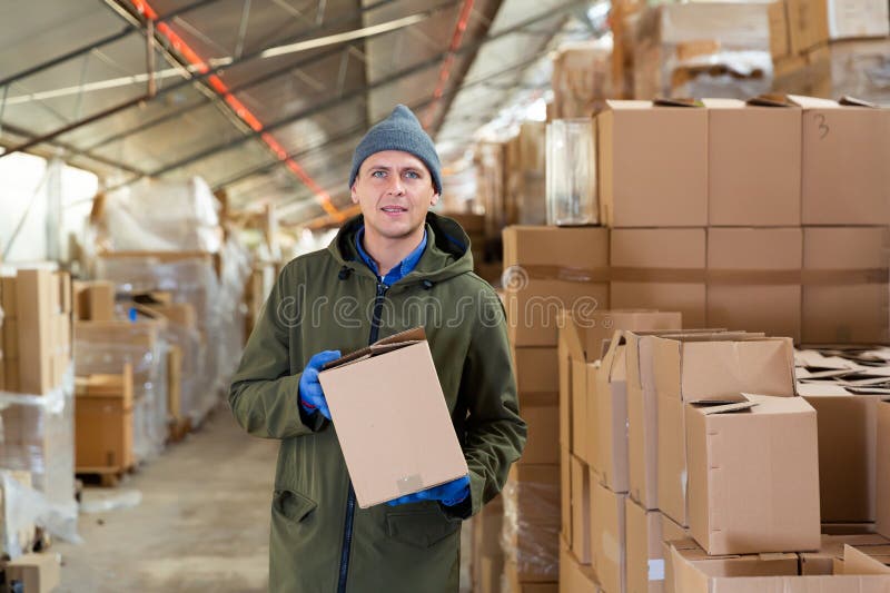 Warehouse Worker with Pasteboard Box Stock Image - Image of storing ...