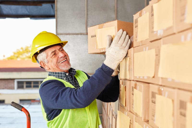 Warehouse Worker Prepares Package in Warehouse for Shipment Stock Image ...