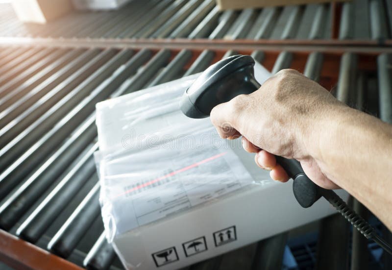 Worker Scanning Barcode Scanner on Package Boxes, Sorting Shipment ...