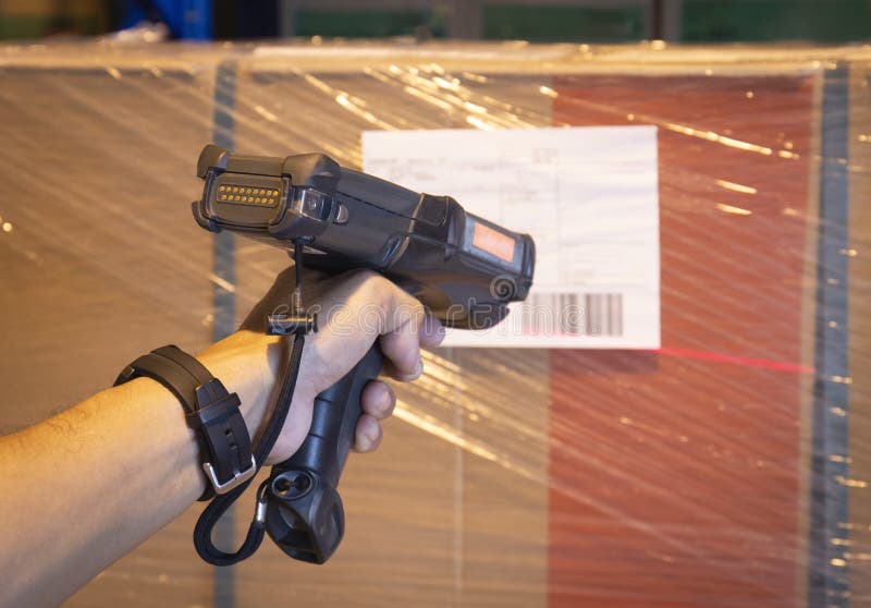 Warehouse Worker Pushing Buttons on Barcode Scanner. Computer Equipment ...