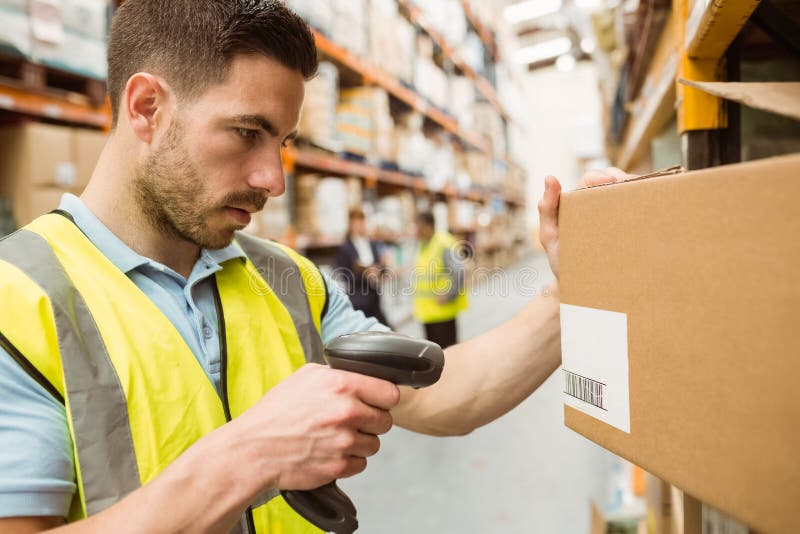 Warehouse Worker Scanning Barcodes on Boxes Stock Image - Image of ...