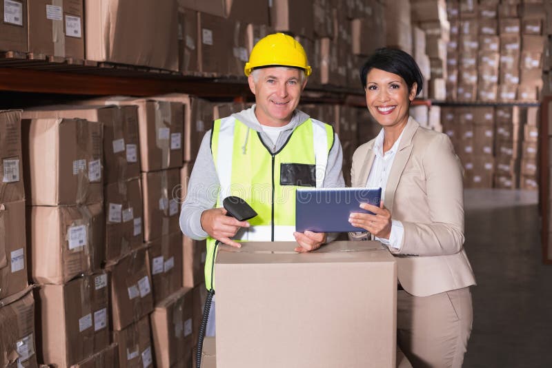 Warehouse Worker Scanning Box with Manager Stock Photo - Image of male ...