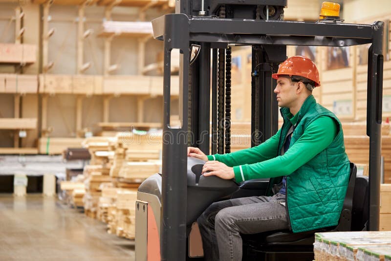 Warehouse Worker Sit Inside of Machine Stock Photo - Image of female ...