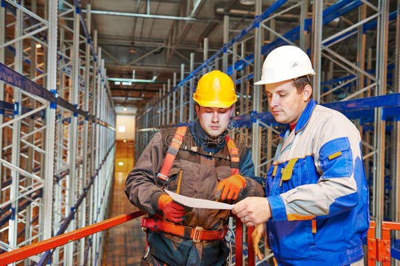 Warehouse Worker in Storehouse Stock Photo - Image of smiling, facility ...