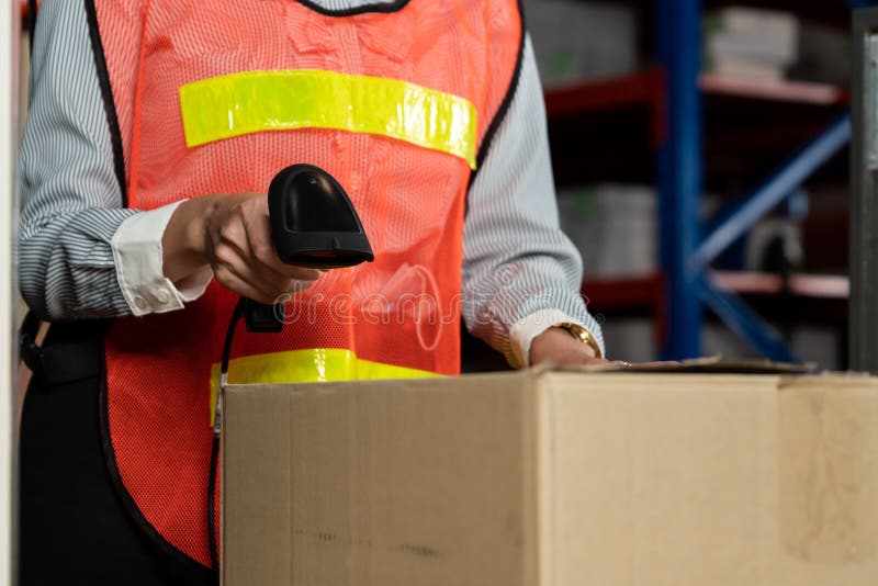 Warehouse Worker Using Barcode Scanner in Storehouse Stock Photo ...
