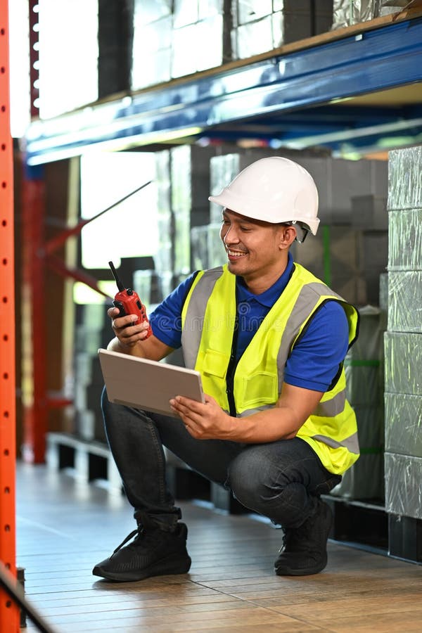 Warehouse Worker Using Digital Tablet, Checking Quantity of Storage ...