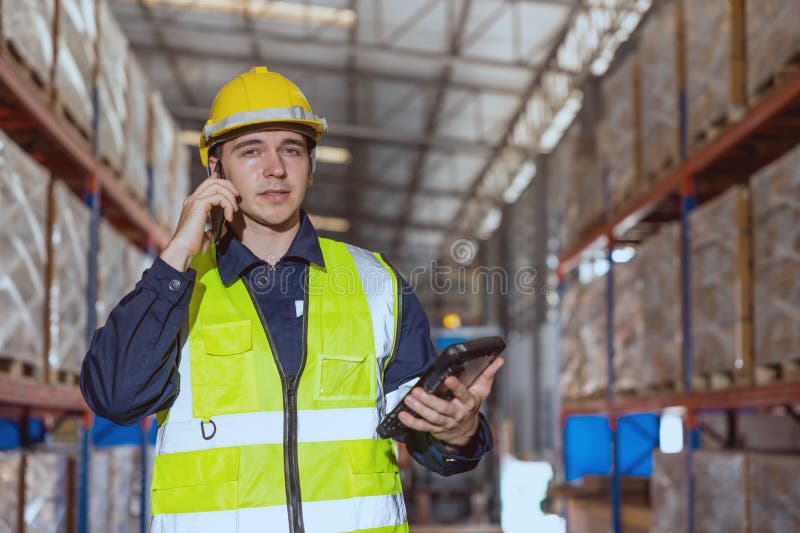 Warehouse Worker Using Smartphone Phone Calling Contact People in ...
