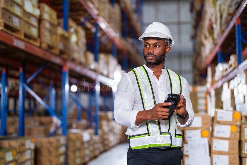 Warehouse Worker Working Process Checking the Package Using Laptop in ...