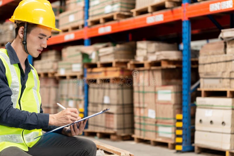 Warehouse Worker Working Together in Warehouse Stock Image - Image of ...
