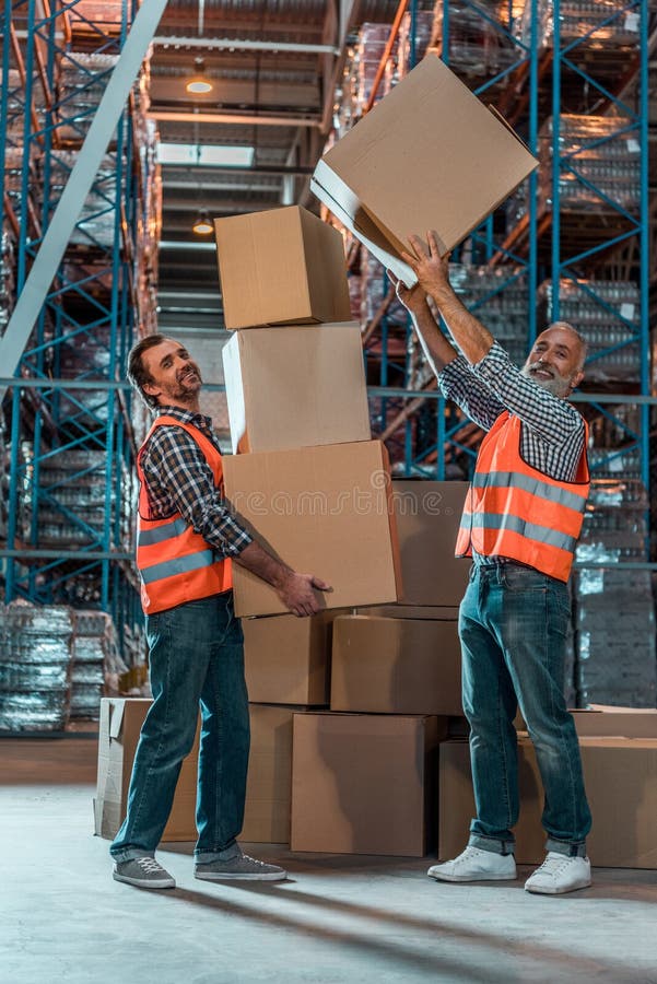 Warehouse Workers with Boxes Stock Photo - Image of full, caucasian ...