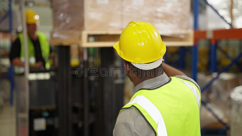 Warehouse Workers Checking and Controlling Boxes in Warehouse Stock ...