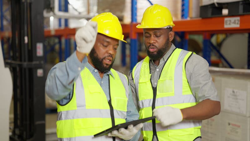 Warehouse Workers Checking and Controlling Boxes in Warehouse Stock ...