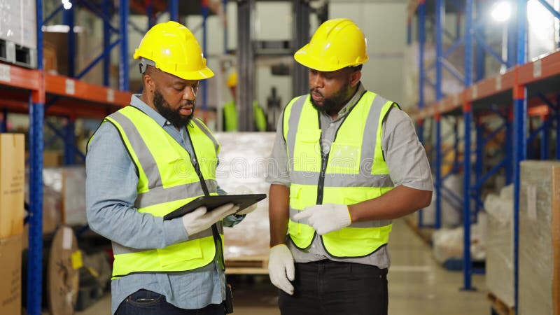Warehouse Workers Checking and Controlling Boxes in Warehouse Stock ...