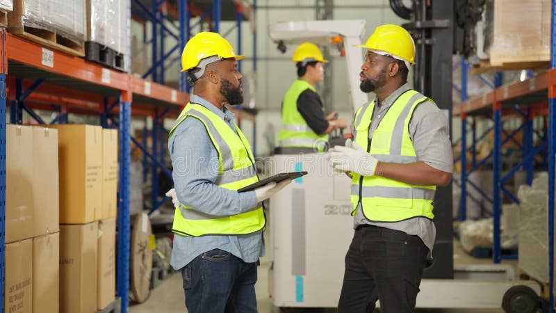 Warehouse Workers Checking and Controlling Boxes in Warehouse Stock ...