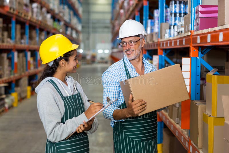 Warehouse Workers Checking the Inventory Stock Photo - Image of goods ...