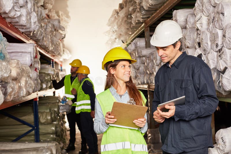 Warehouse Worker with Clipboard and Tablet PC Stock Photo - Image of ...