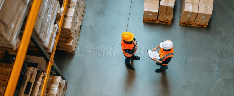 The Warehouse Workers Discussing Inventory Management and Safety ...