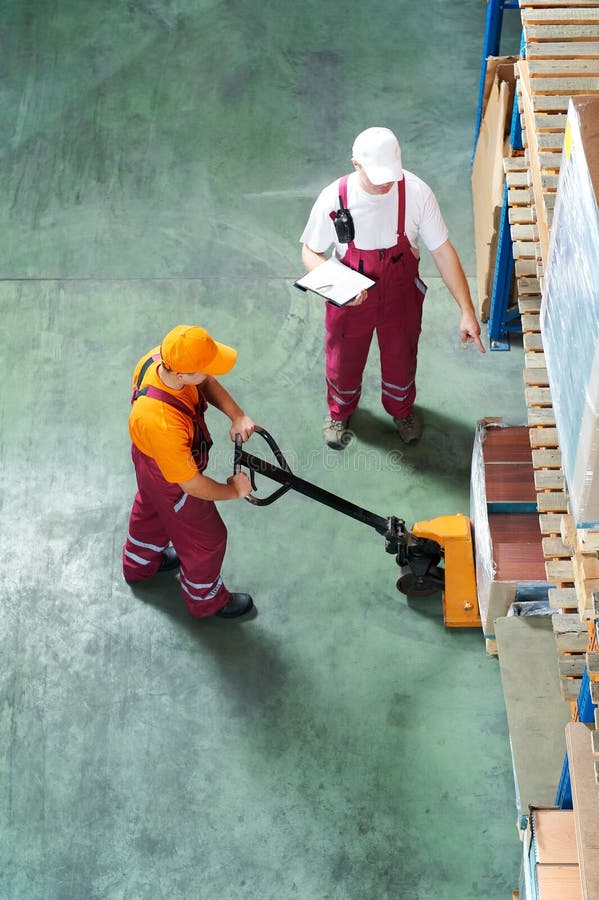 Warehouse Worker Standing by Forklift Stock Photo - Image of caucasian ...