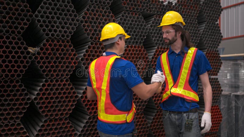 Warehouse Workers in Hard Hats and Helmets, Inspect and Count Steel ...