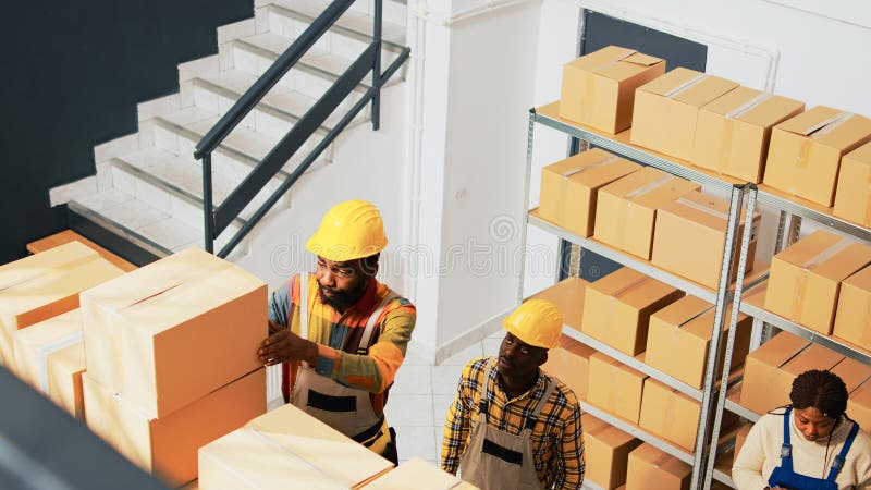 Warehouse Workers Organizing Goods in Packs Stock Image - Image of ...