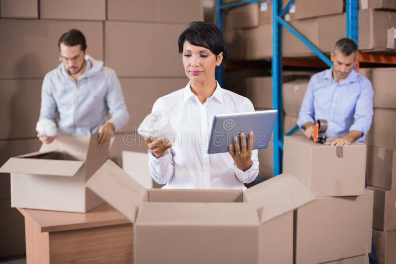 Warehouse Workers Packing Up Boxes Stock Photo - Image of shipping ...