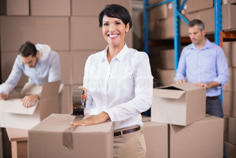 Warehouse Workers Packing Up Boxes Stock Image - Image of distribution ...