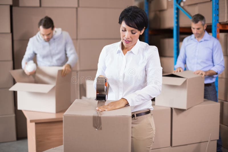 Warehouse Workers Packing Up Boxes Stock Photo - Image of shipping ...