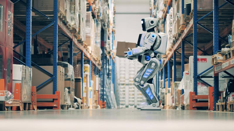 Warehouse Workers and Robot Moving Along the Aisle Stock Video - Video ...