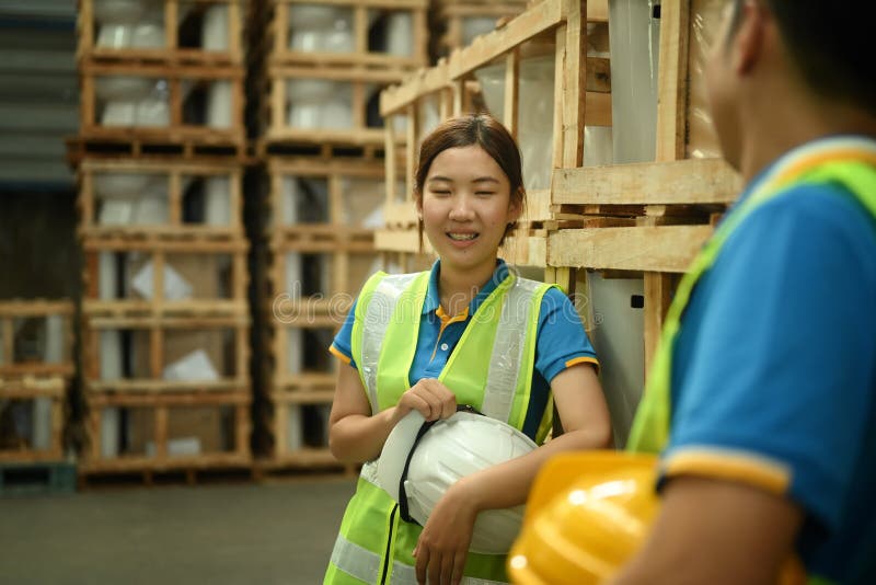 Warehouse Workers Wearing Safety Hardhat Working on Retail Warehouse ...
