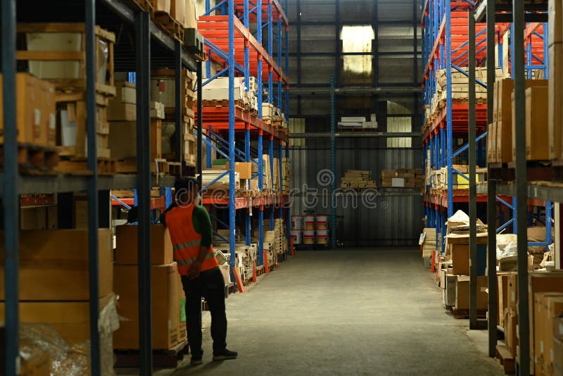 Warehouse Workers Wearing Safety Hardhat Working on Retail Warehouse ...
