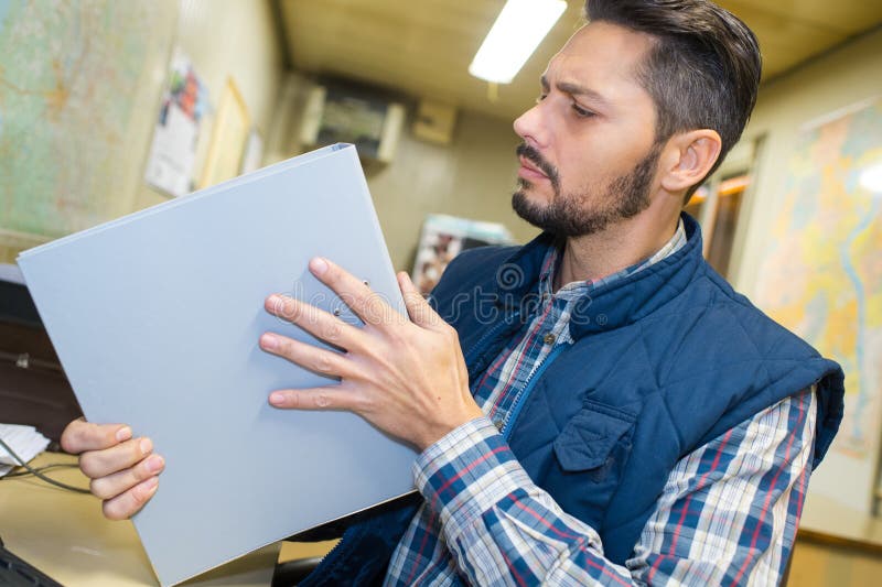 Warehouse Workerwith Folder in Hands Stock Image - Image of indoor ...