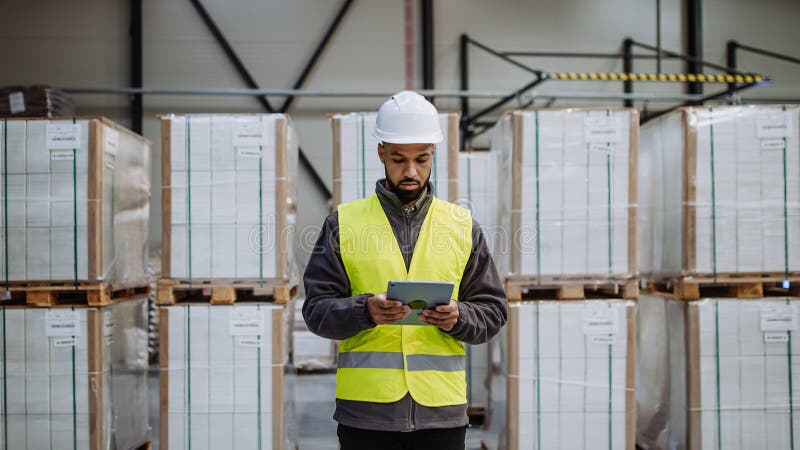 Warehouseman with Tablet Checking Delivery, Stock in Warehouse ...