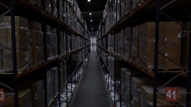 Warehouses Large Logistics Commerce Structure with Boxes on the Shelves ...