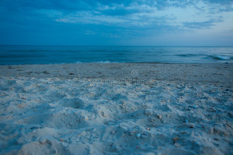 Warm Blue Sunset on the Shore of the Ocean, the Sea, at Sunset on a ...