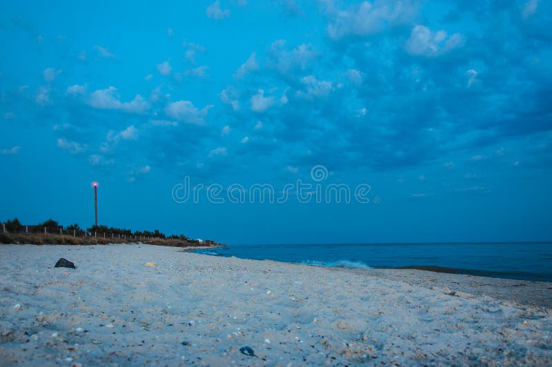 Warm Blue Sunset on the Shore of the Ocean, the Sea, at Sunset on a ...