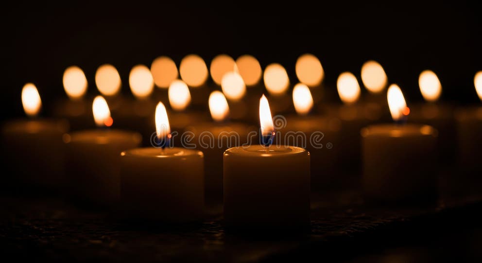 Warm Candlelight Glow in Dark Ambiance with Multiple Flickering Flames ...